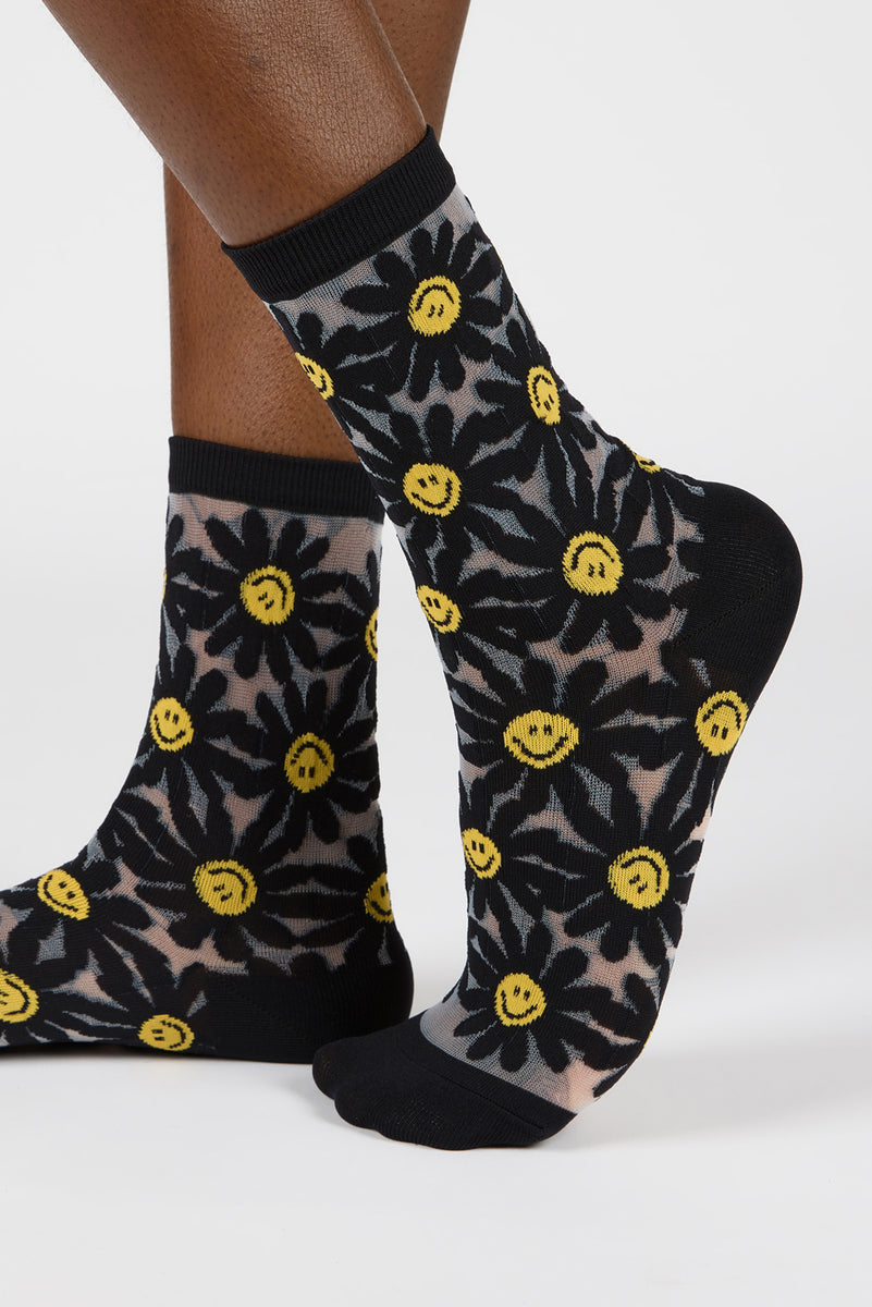 Black sheer daisy smiley face socks | Glassworks London