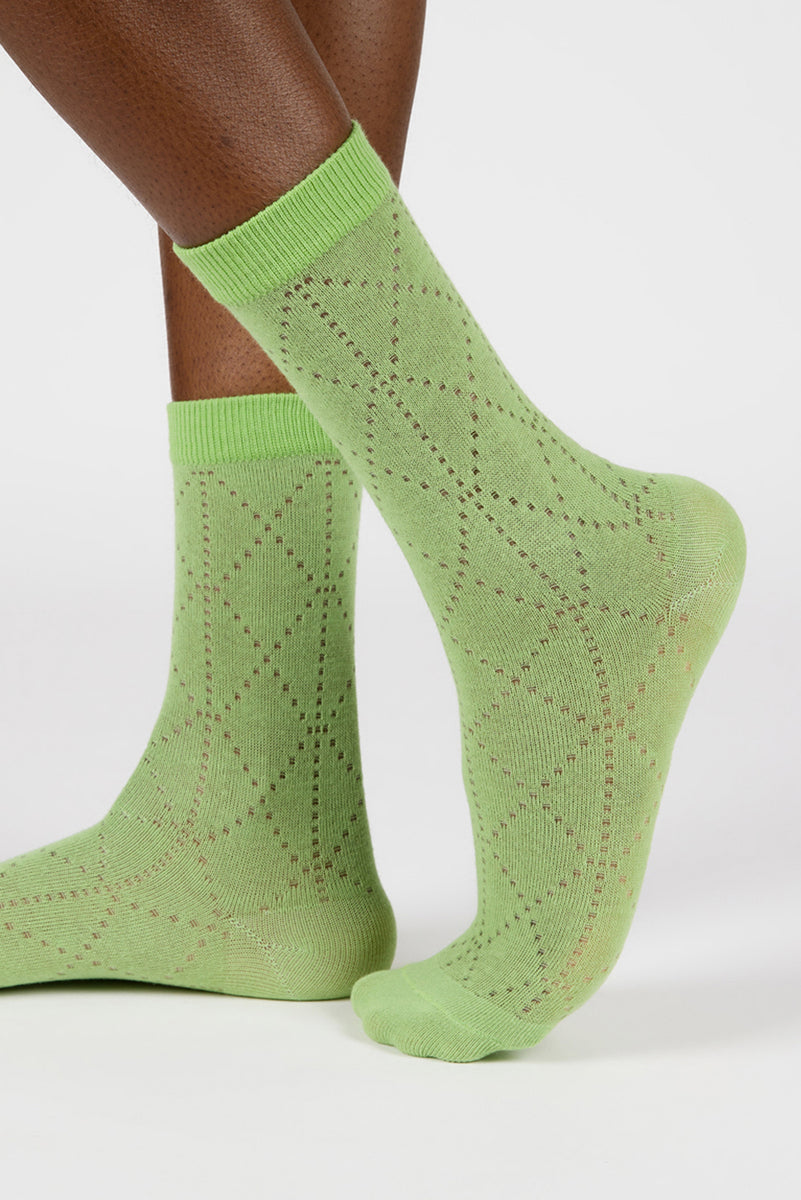 Green semi sheer dotted diamond socks | Glassworks London