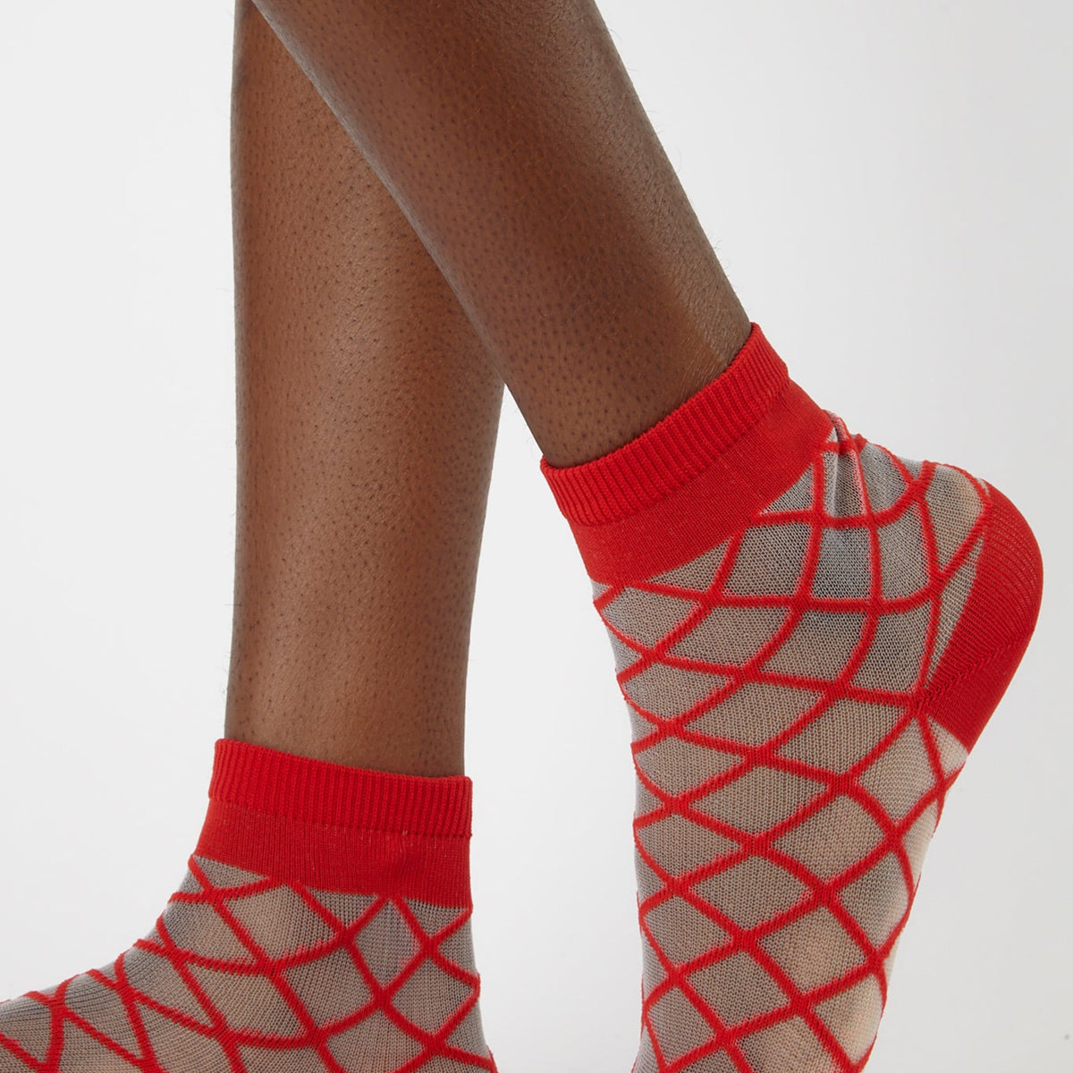 Red sheer criss cross socks | Glassworks London