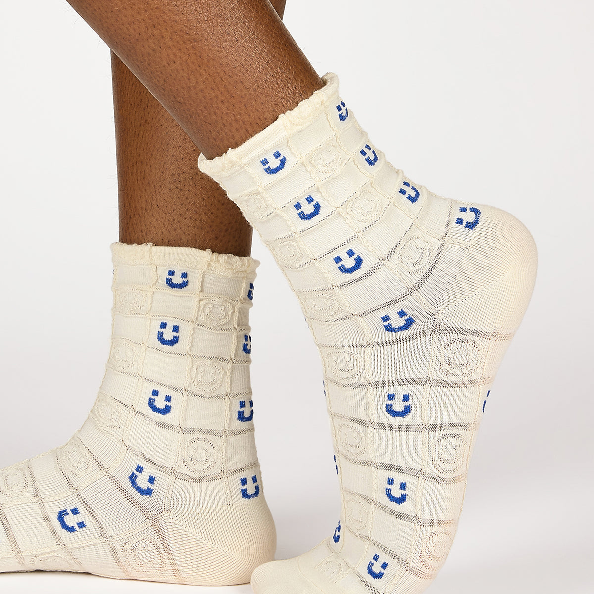 White and black checked smiley face socks | Glassworks London