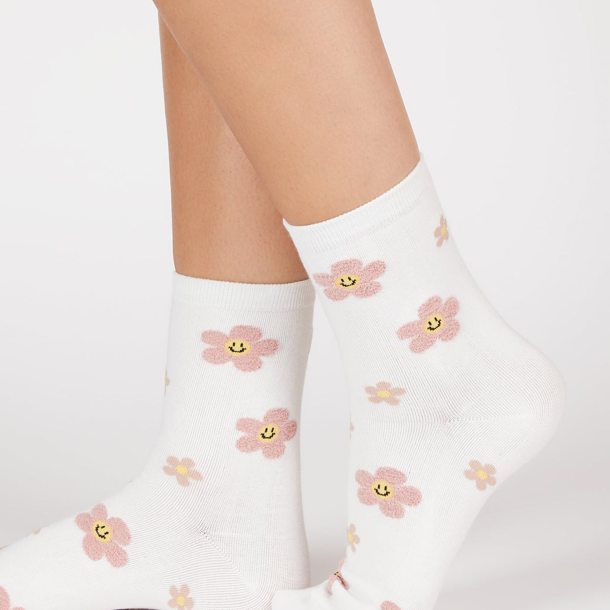 White and pink daisy smiley face socks | Glassworks London